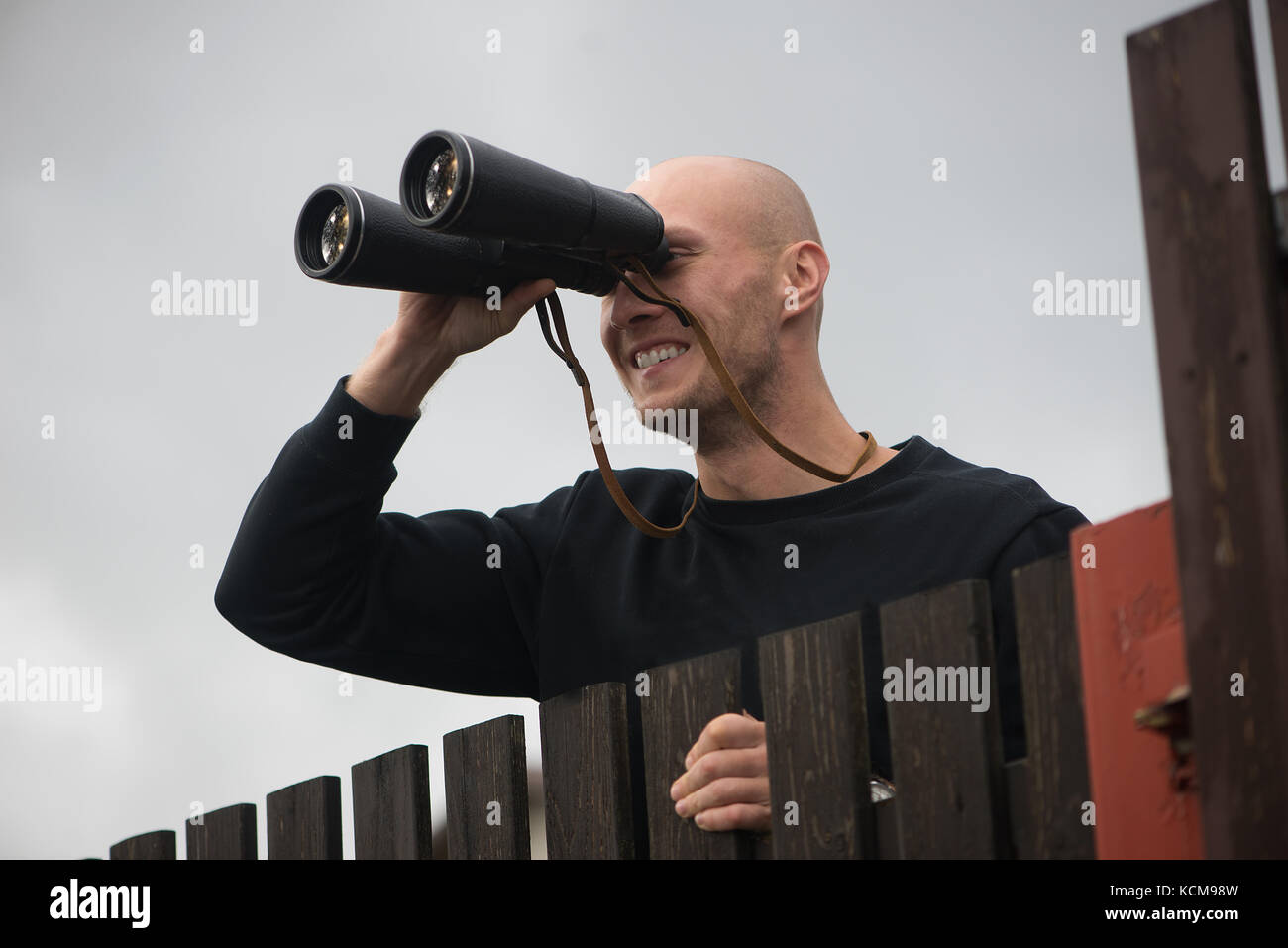 Hunter looking using binocular hi-res stock photography and images - Alamy
