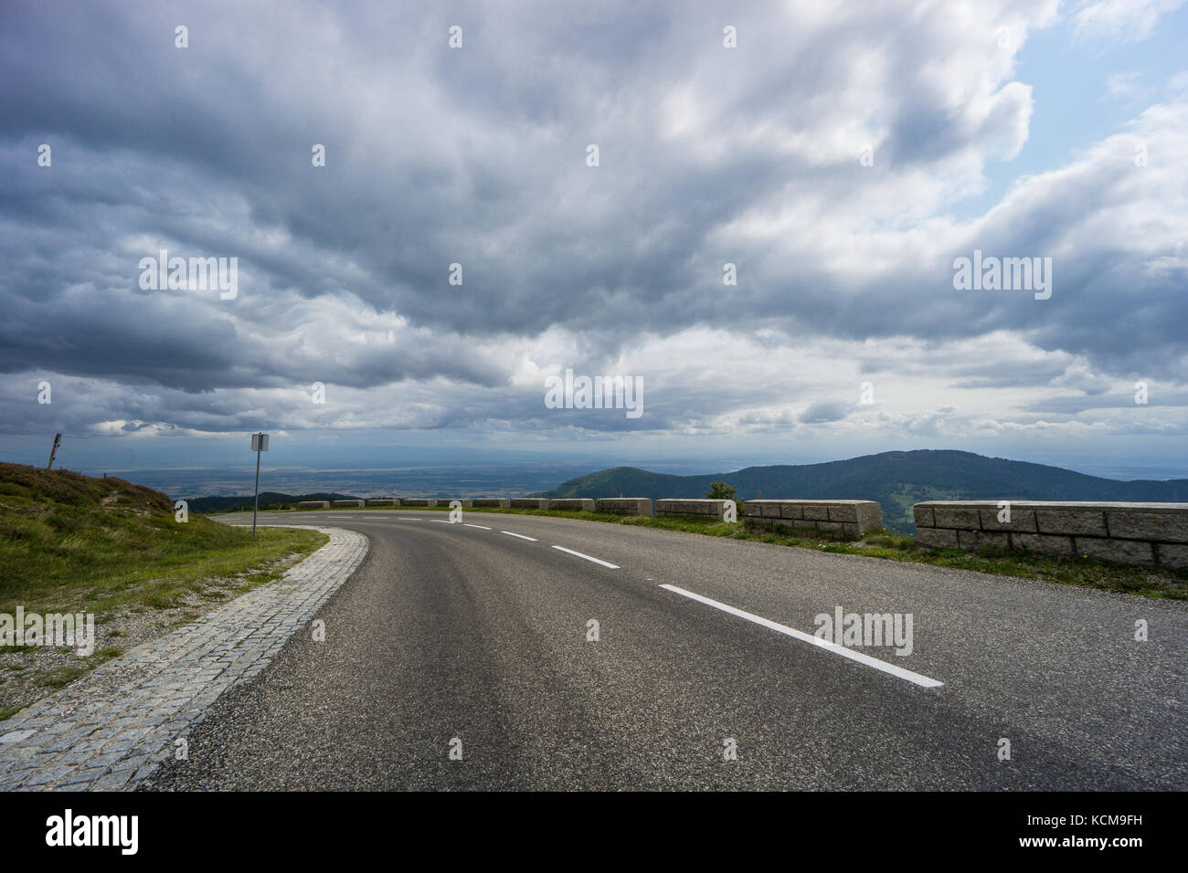France - Left turn street of route de cretes with wide flat and ...