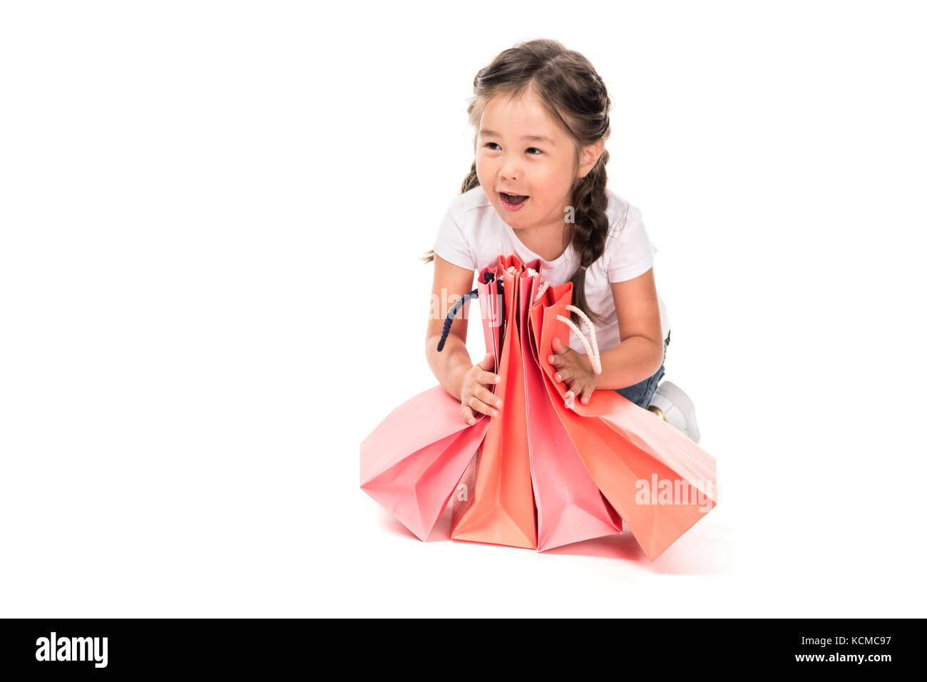 kid with shopping bags Stock Photo - Alamy