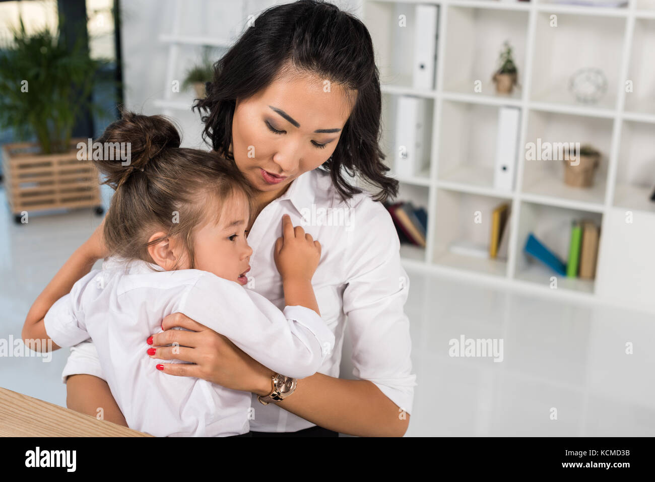 asian businesswoman with daughter Stock Photo - Alamy