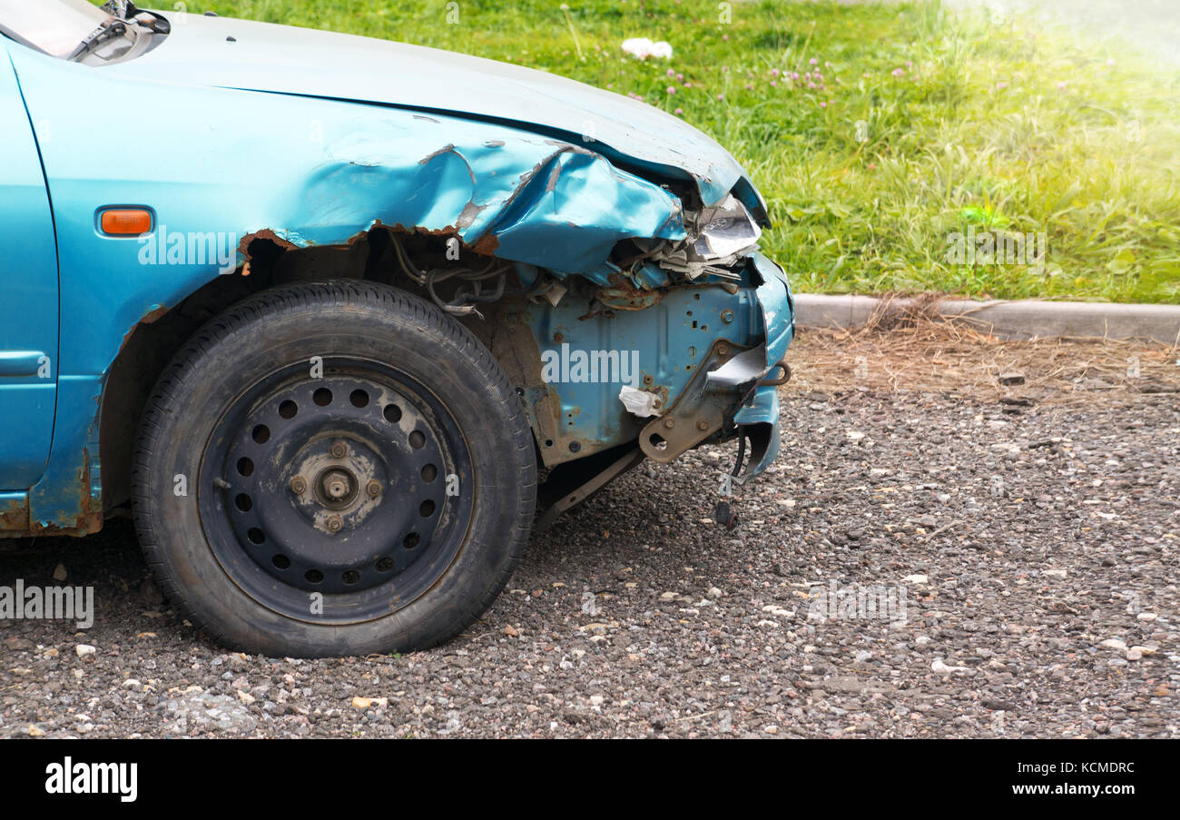 broken blue car with a broken bumper on the street Stock Photo - Alamy