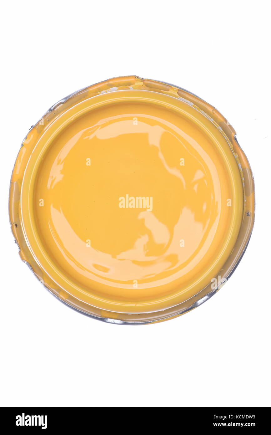 Yellow paint can lid isolated on white background, top view Stock Photo ...