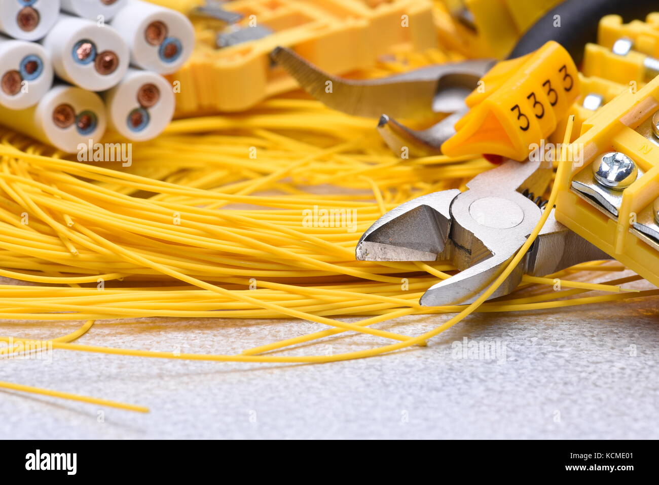 Tools and cables used in electrical home installation, closeup Stock ...