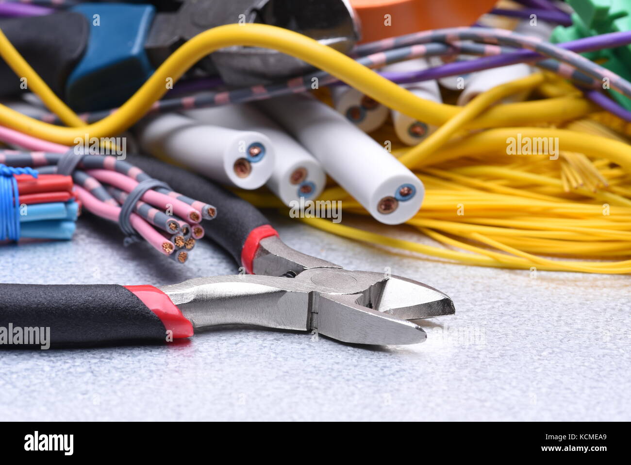 Tools and cables used in electrical home installation, closeup Stock ...