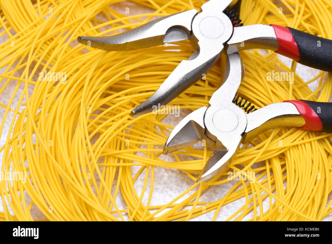 Tools and cables used in electrical home installation, closeup Stock ...