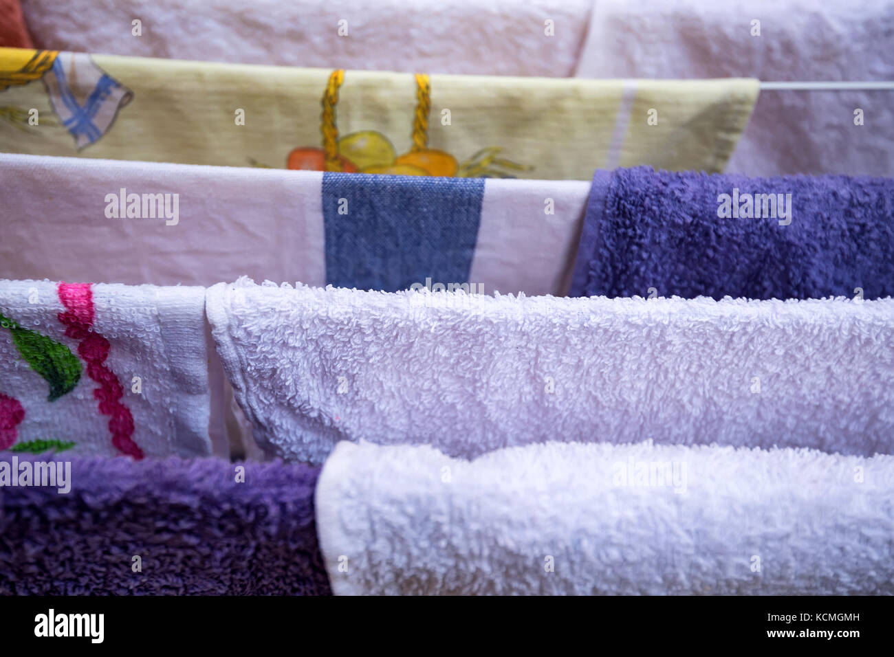 Close up colorful laundry drying Stock Photo - Alamy