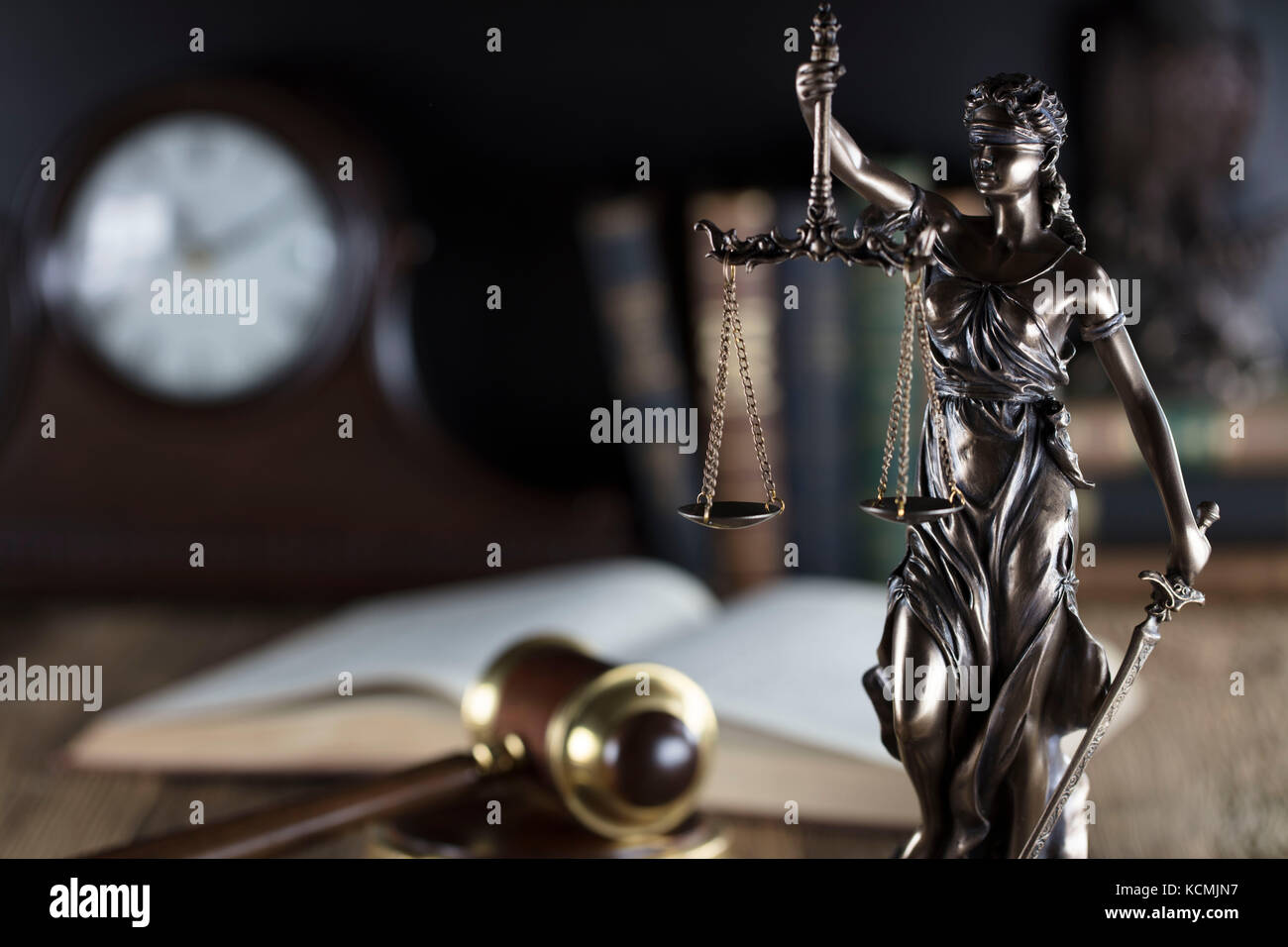 Old court library. Vintage clock. Statue of justice and gavel. Law ...