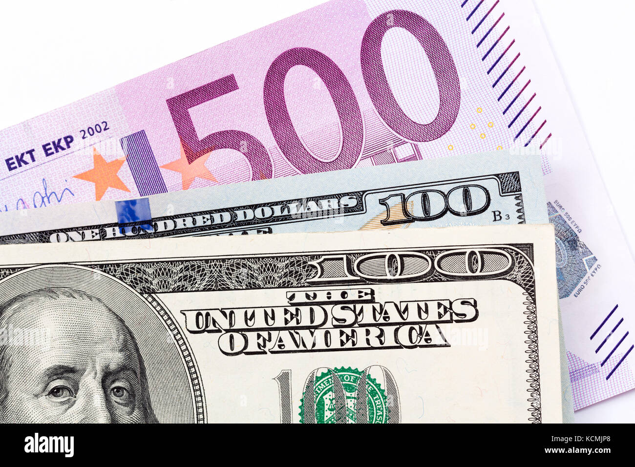 Close up of euros and dollars on white background Stock Photo - Alamy