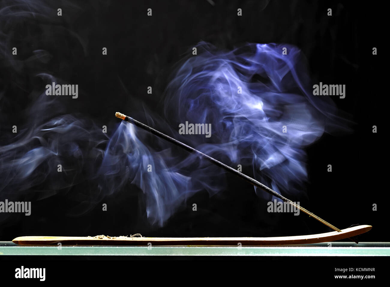 Aromatic stick smoldering and emits intense smoke Stock Photo - Alamy