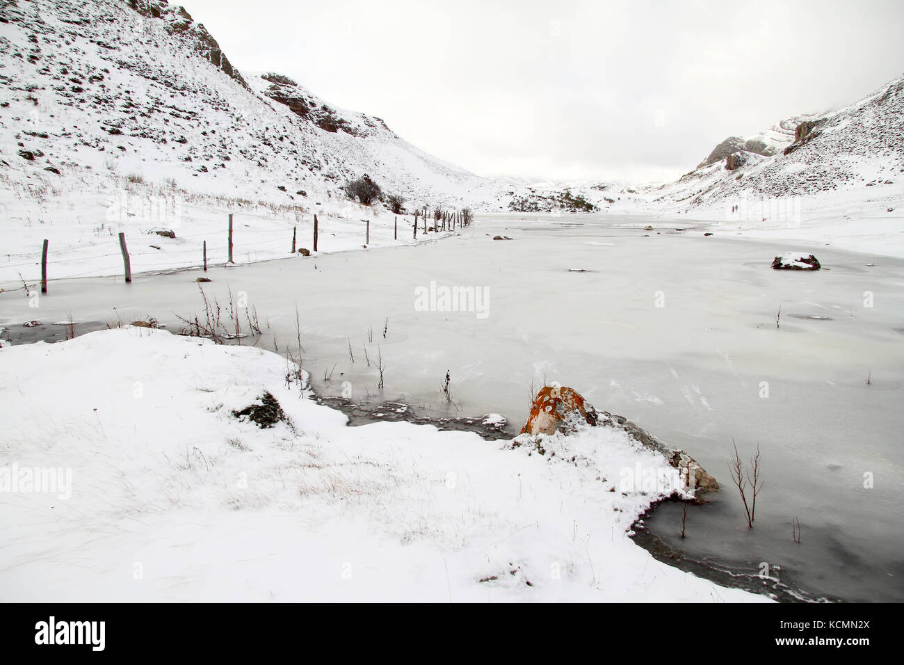 Frozen lake in winter, Lago de Babia, Leon, Spain Stock Photo - Alamy