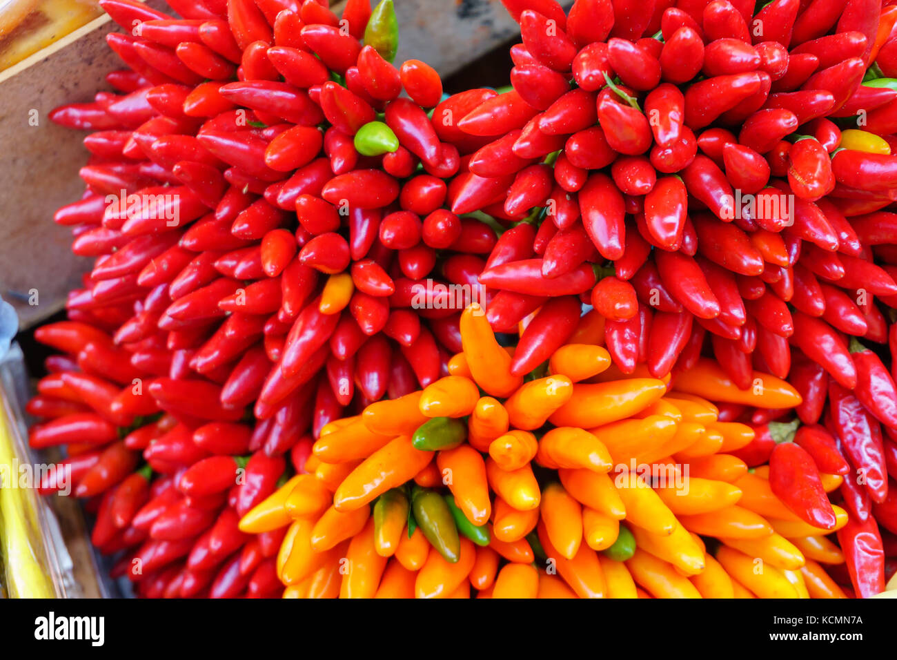 Red Chillies Background color image Stock Photo - Alamy
