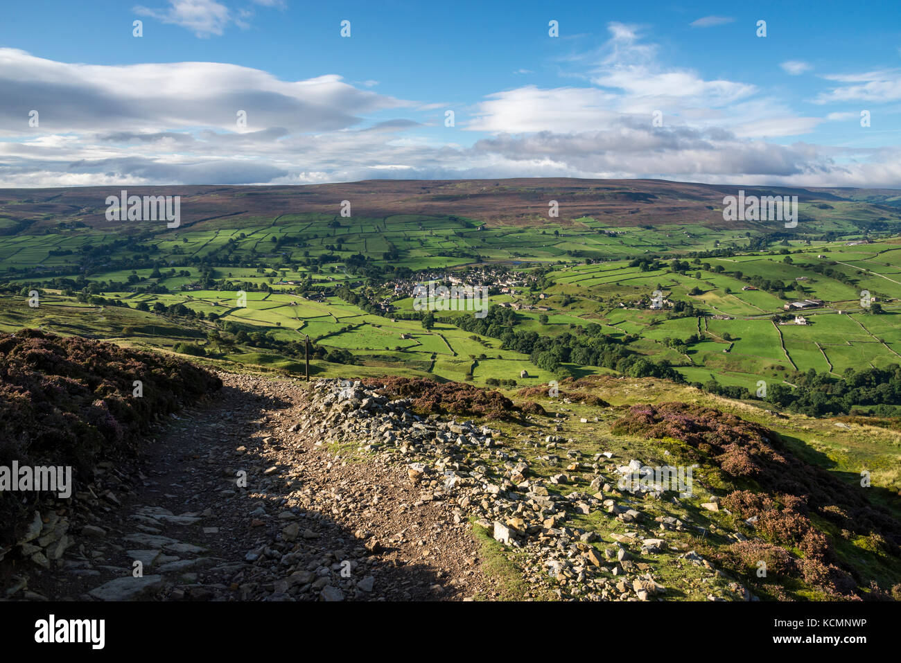 Stony path on Fremington edge with beautiful view of the village of ...