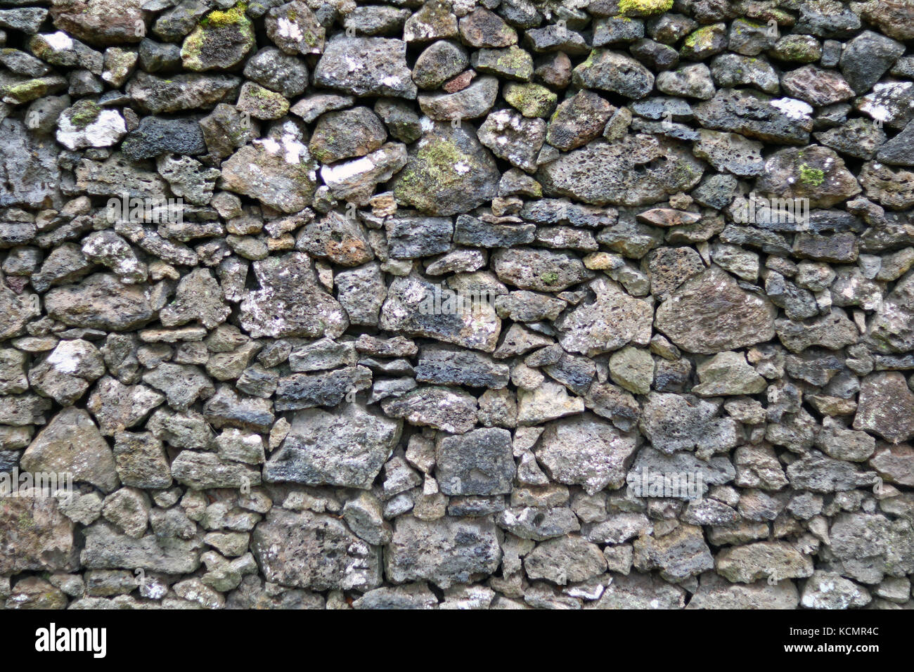 Detail of rocks in a dry stone wall Stock Photo - Alamy