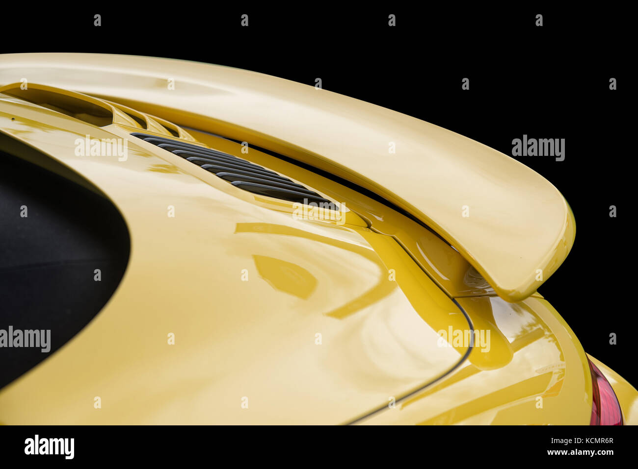 Close up on yellow sport car rear spoiler Stock Photo - Alamy