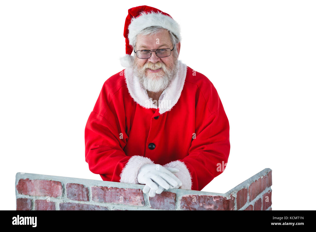 Portrait of santa claus leaning on the chimney against white background ...
