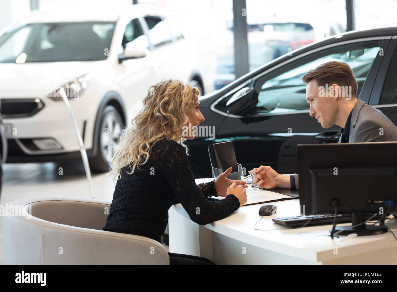Car salesman sitting desk in hi-res stock photography and images - Alamy