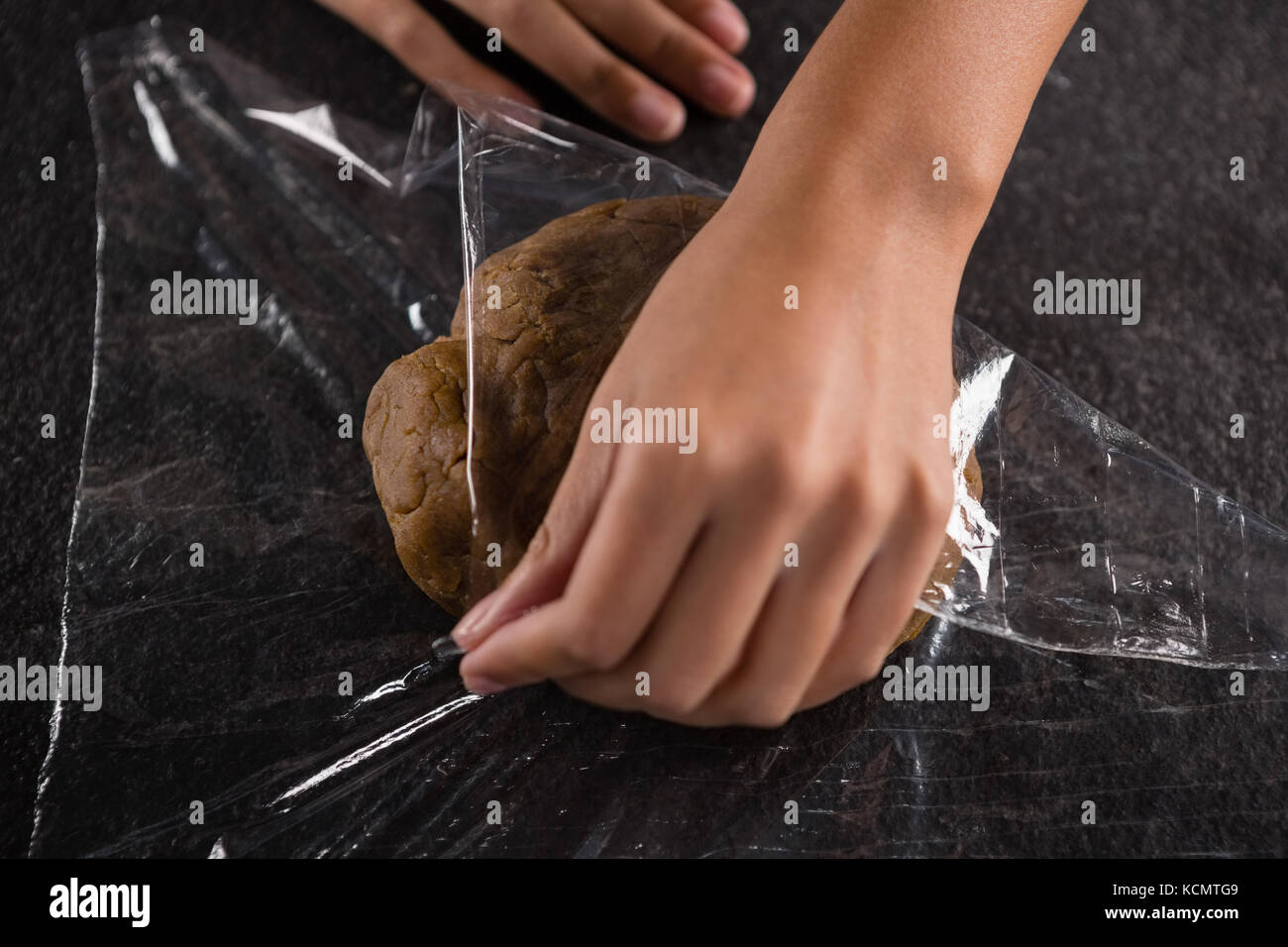 Woman plastic wrap hi-res stock photography and images - Alamy