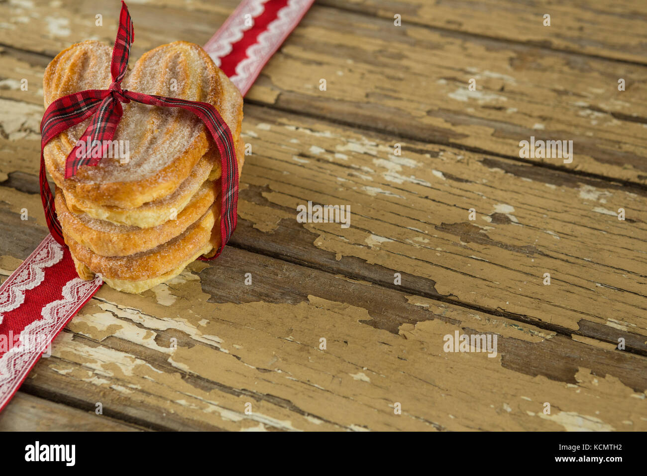 Close-up of sweet food tied on lace Stock Photo - Alamy