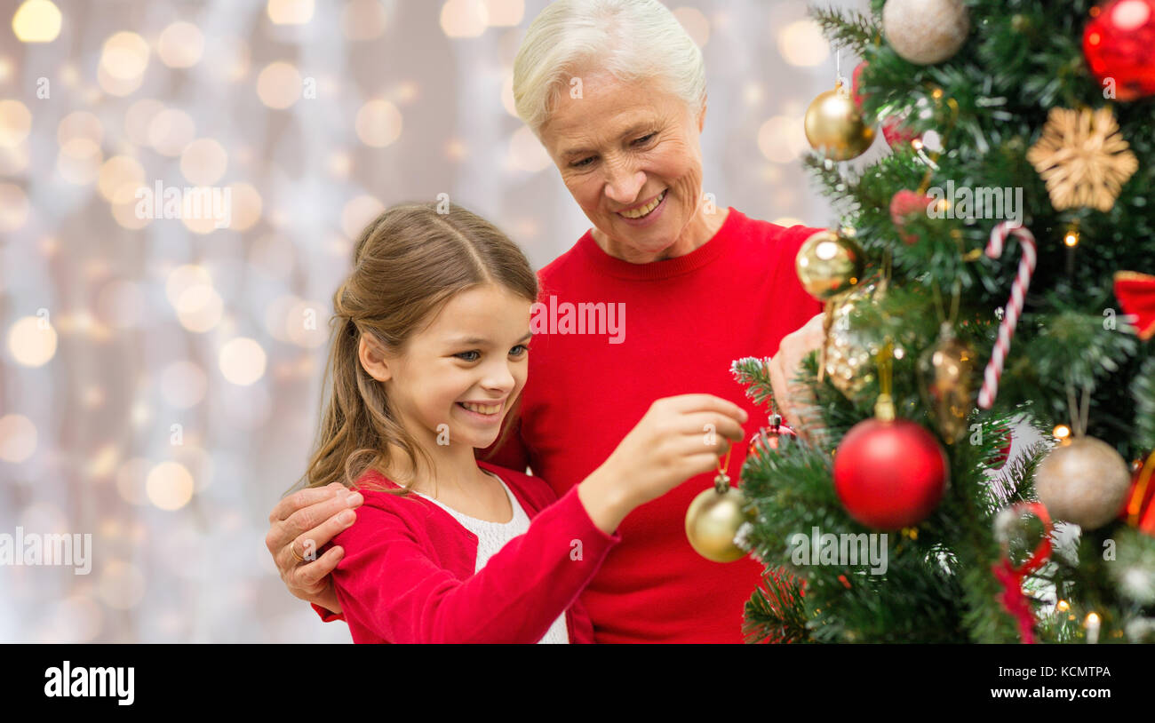 grandmother and granddaughter at christmas tree Stock Photo - Alamy grandmother and granddaughter at christmas tree Stock Photo - Alamy