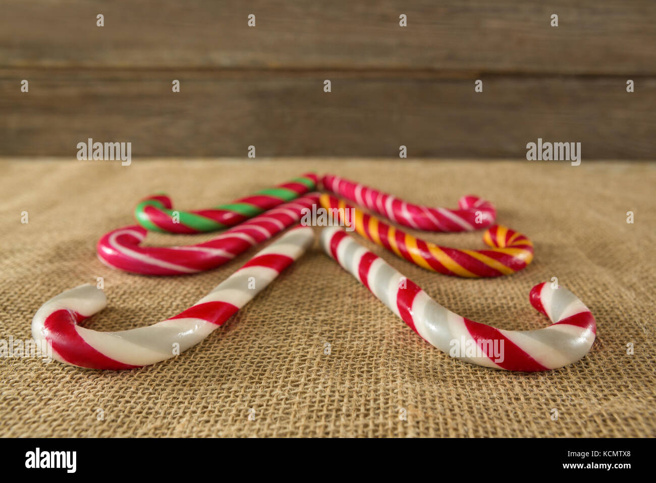 Close-up of multicolored candy canes arranged on fabric Stock Photo - Alamy