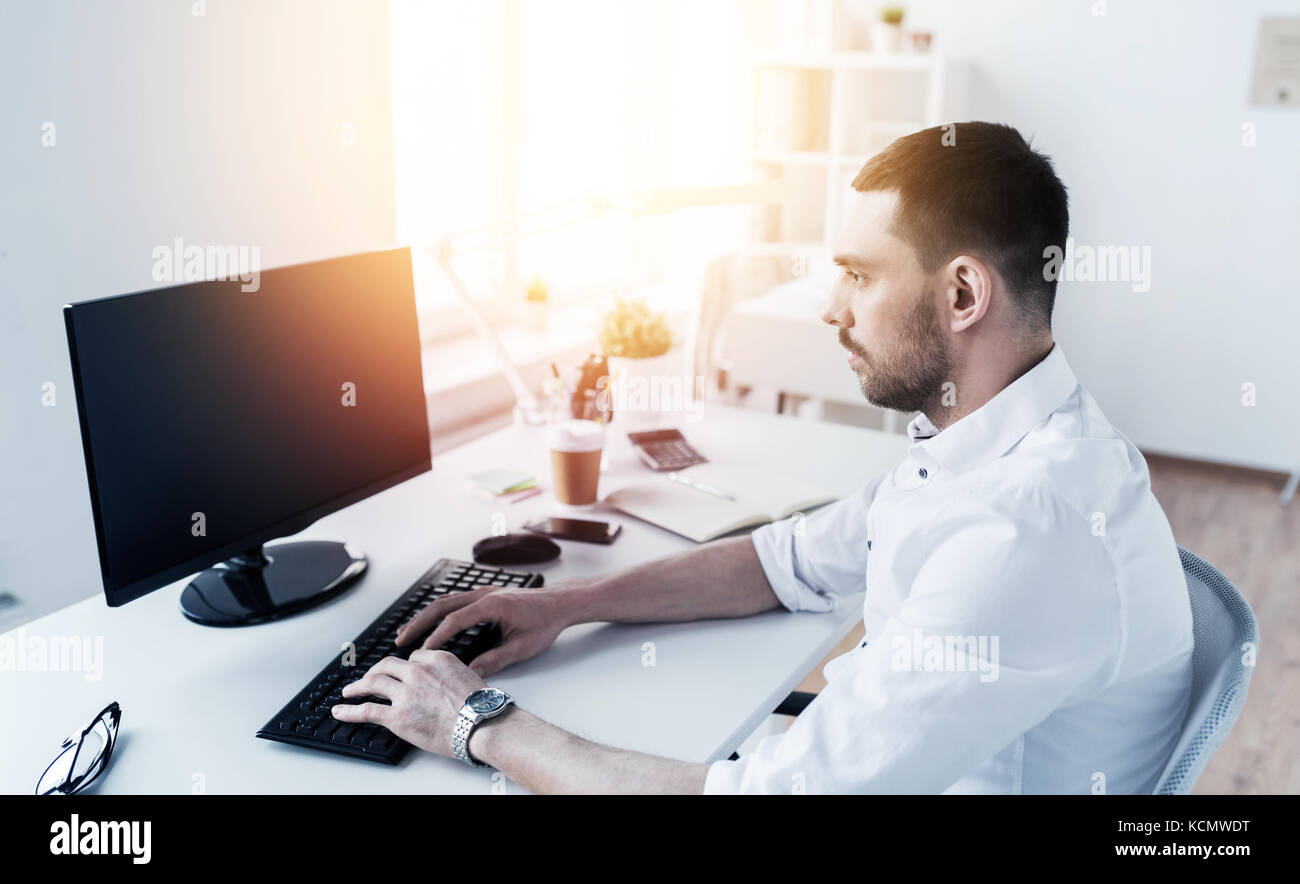 businessman typing on computer keyboard at office Stock Photo - Alamy