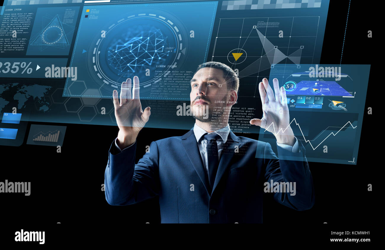 businessman with virtual projection over black Stock Photo - Alamy