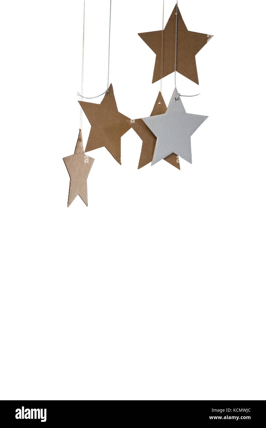 Close-up of star shape decorations on white background Stock Photo - Alamy