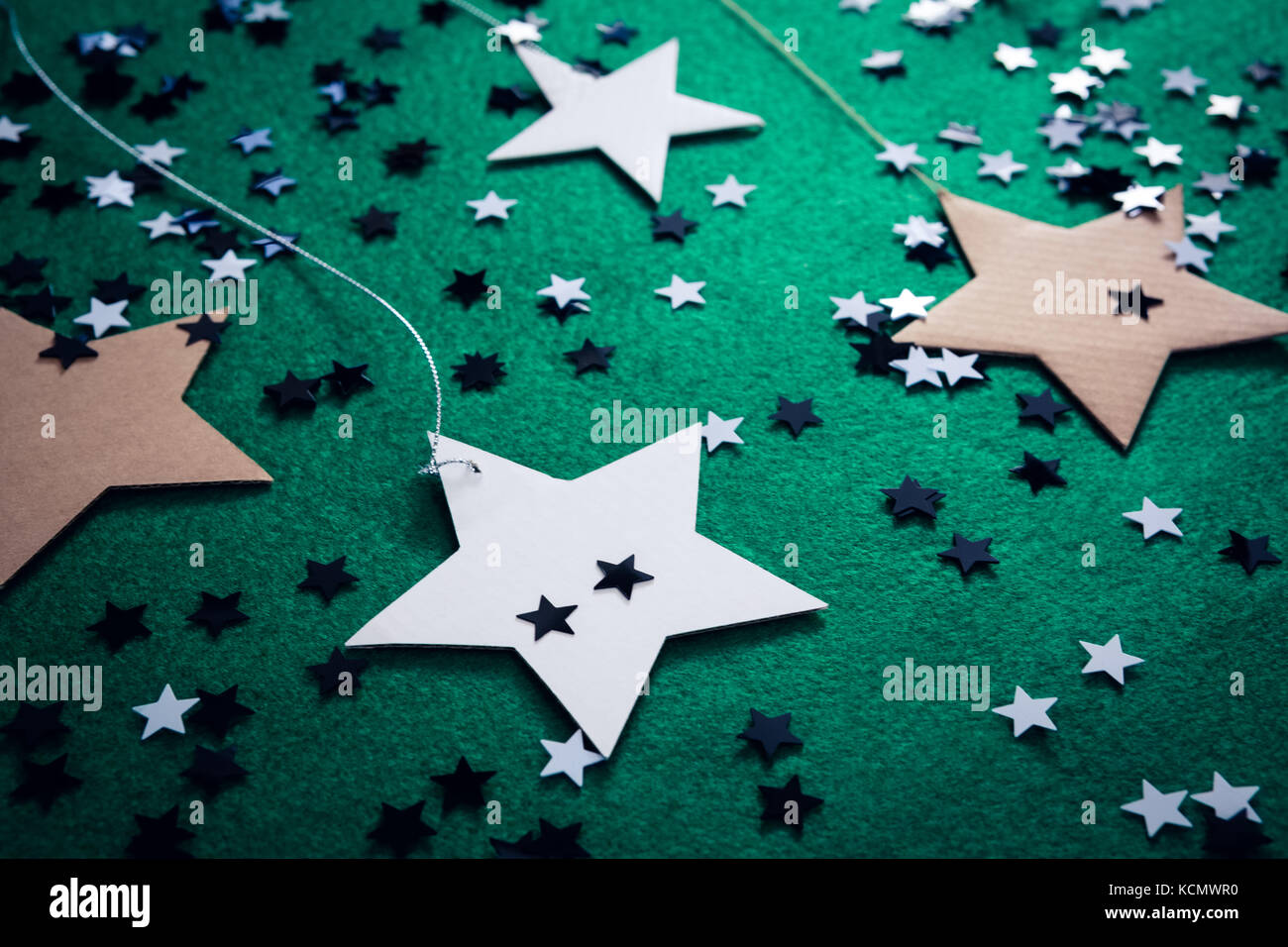 Close-up of handmade stars on green background Stock Photo - Alamy