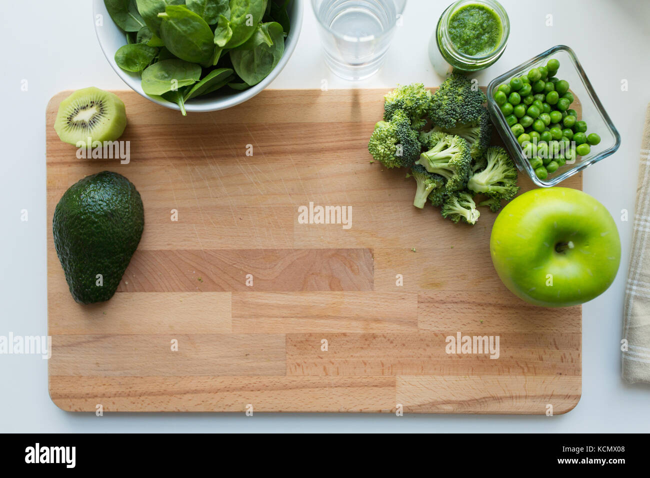 vegetable puree or baby food and fruits on board Stock Photo - Alamy