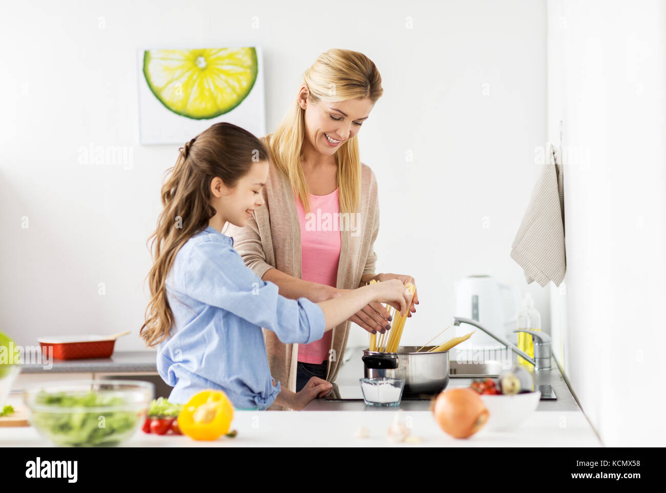 Teen girl cooking healthy food hi-res stock photography and images - Alamy