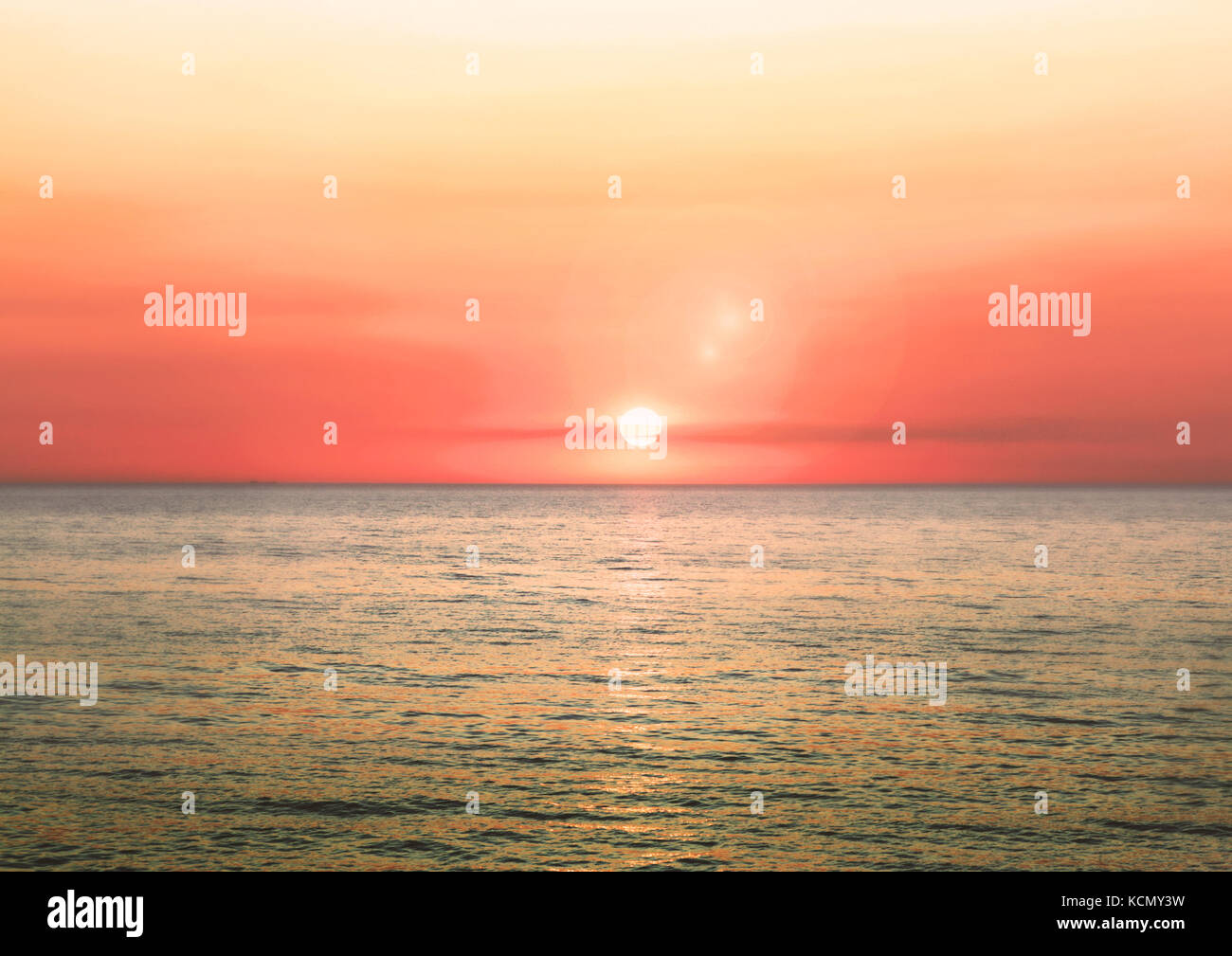 Beautiful blazing sunset landscape on a sea and sun Stock Photo - Alamy