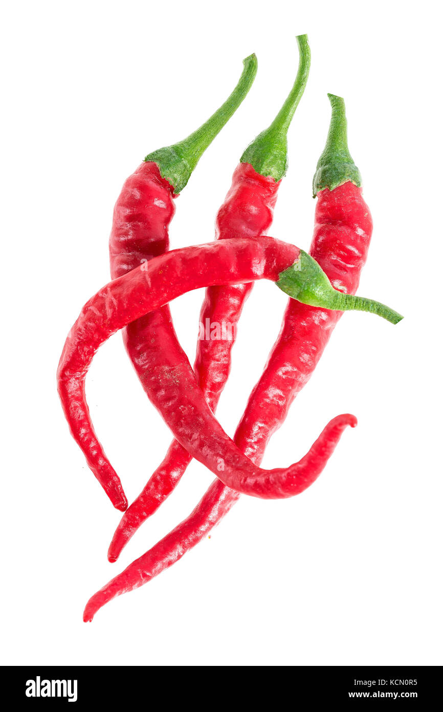 Group of three chili re peppers isolated on white background as package ...