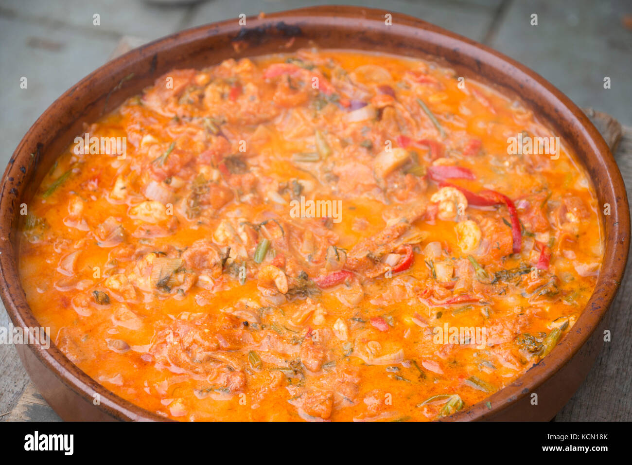Delicious traditional greek dish garides saganaki Stock Photo - Alamy