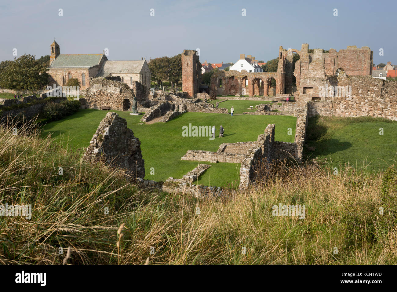 The landscape surrounding the early 12th century Lindisfarne Priory on ...