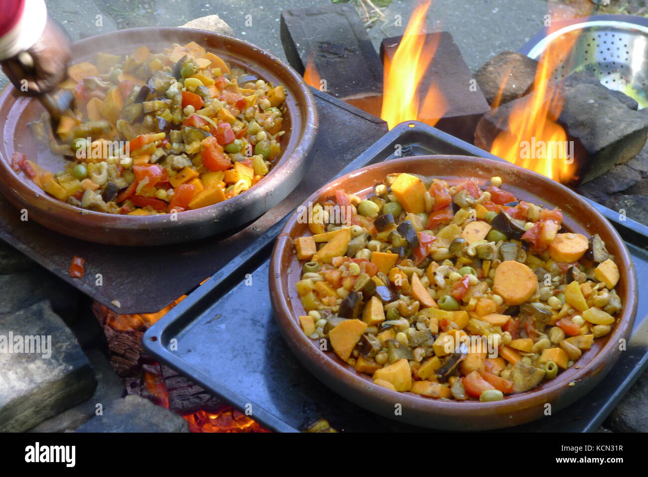 Cooking a moroccan tajine in marrakech hi-res stock photography and ...
