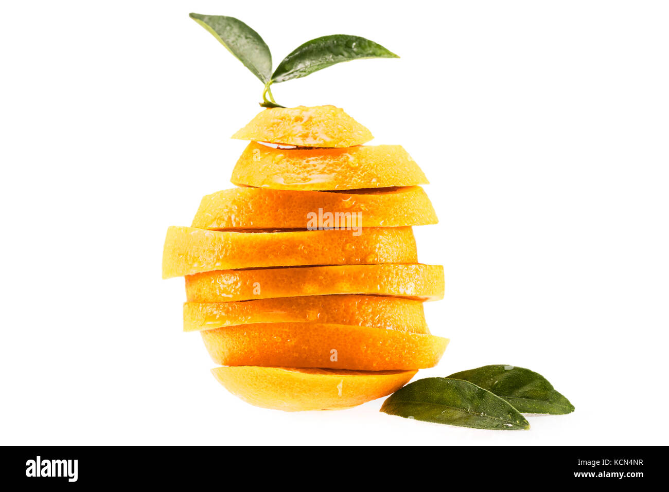Orange fruit leaves slices Cut Out Stock Images & Pictures - Alamy