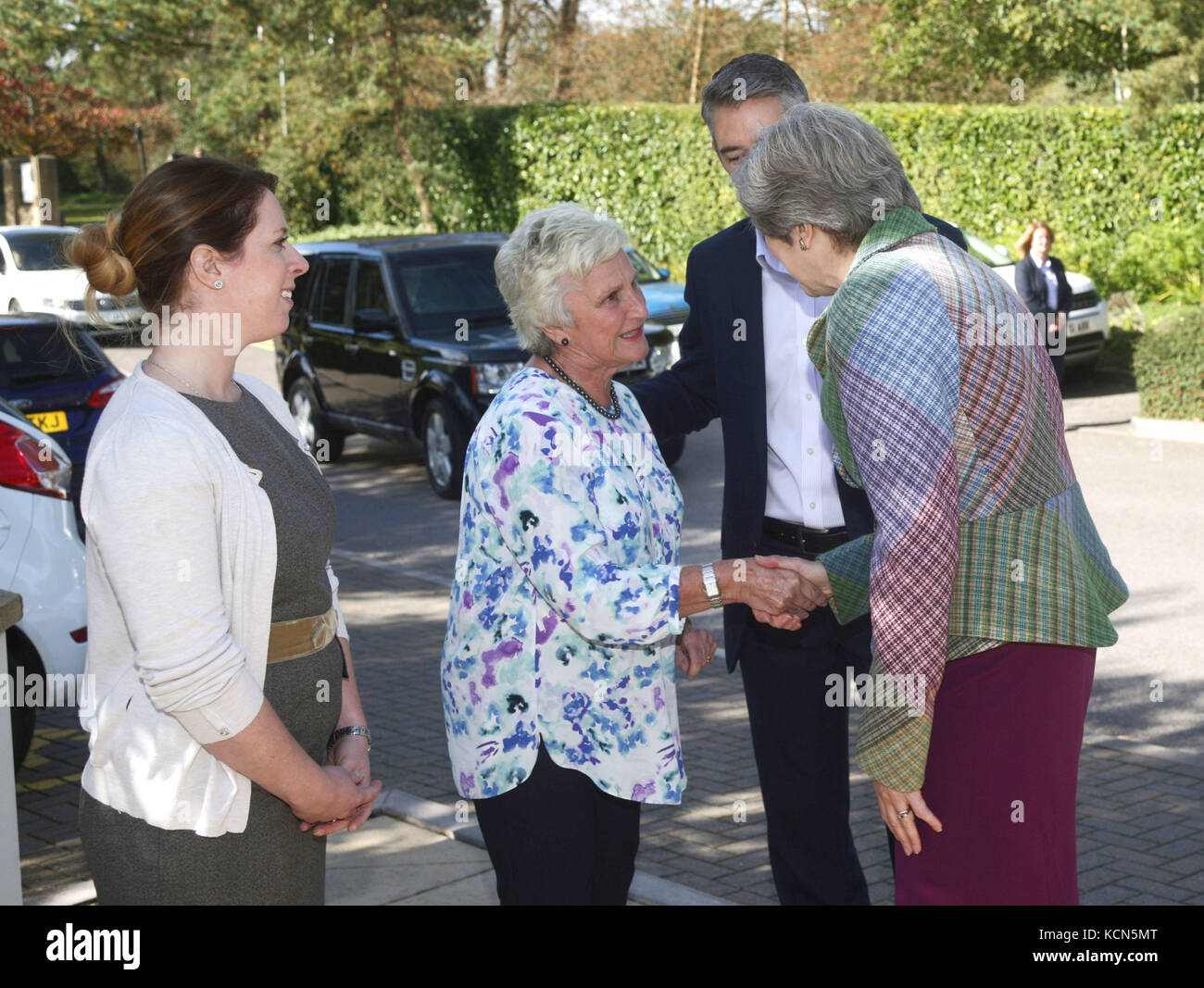 Prime Minister Theresa May meets (left to right) Clare Barbe, Doreen ...