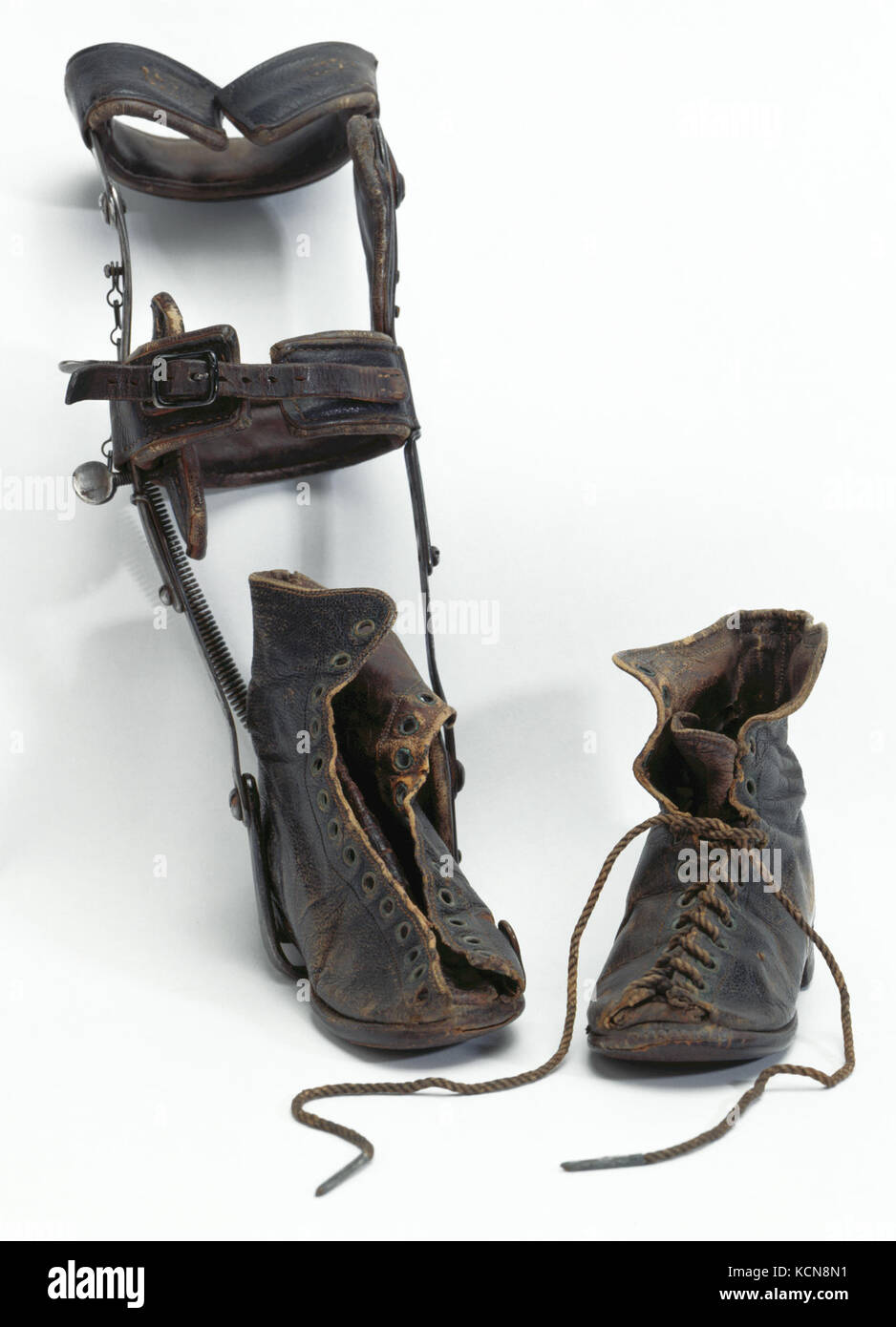 A photograph of a child's leg brace with corrective shoes designed to ...