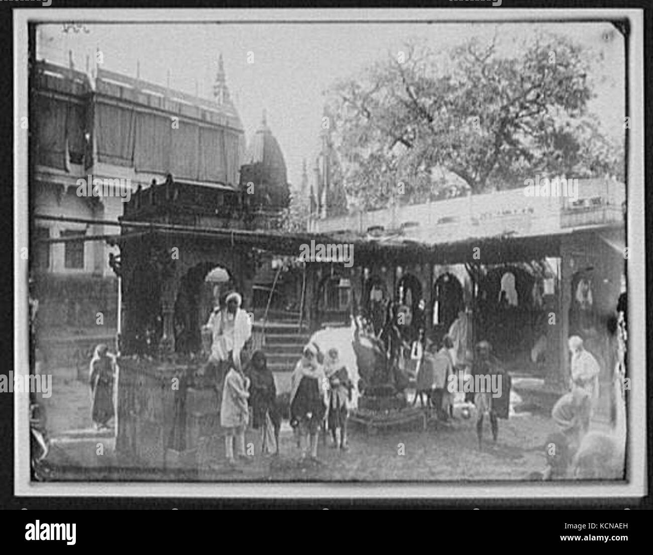 Benares the well of knowledge with the spires of the Golden Temple in ...
