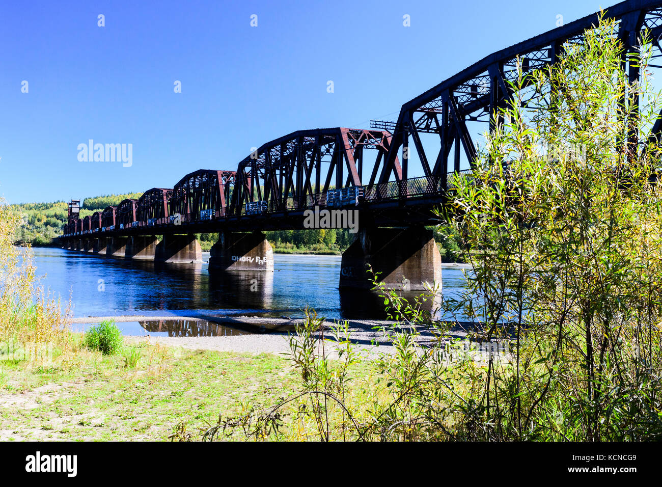 A rail bridge over the Fraser River in Prince George, British Columbia ...