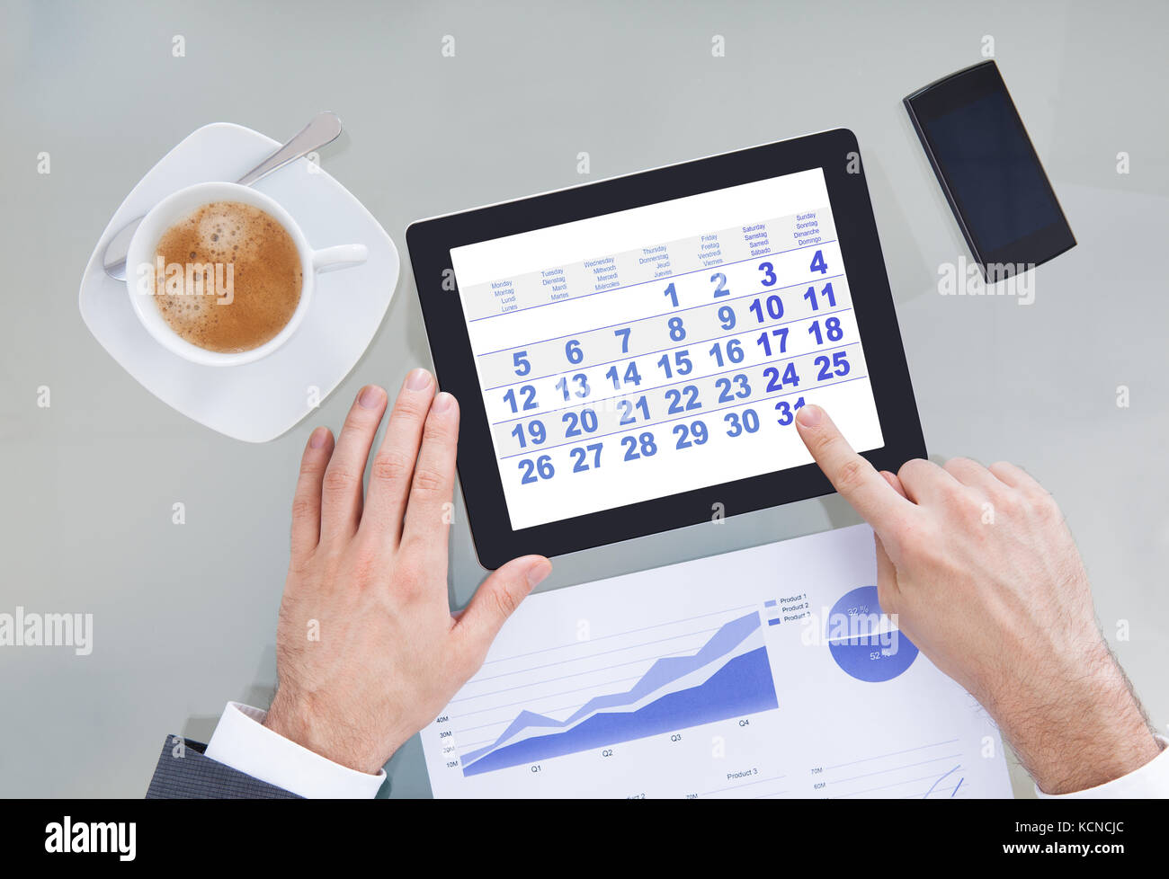 Close-up Of Hand Pointing At Calendar Shown On Digital Tablet Stock ...