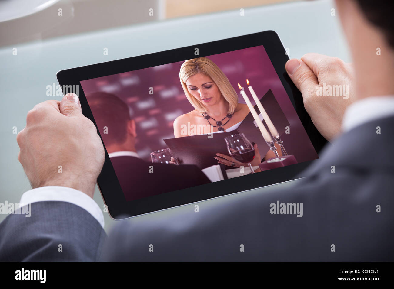 Close-up Of Businessman Watching Video On Digital Tablet Stock Photo ...