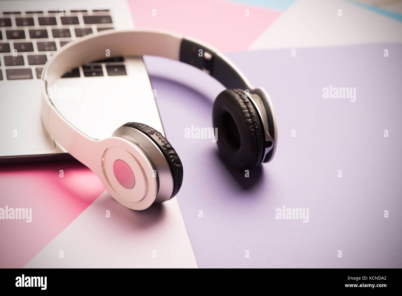 headphones and laptop computer closeup. online music concept Stock ...