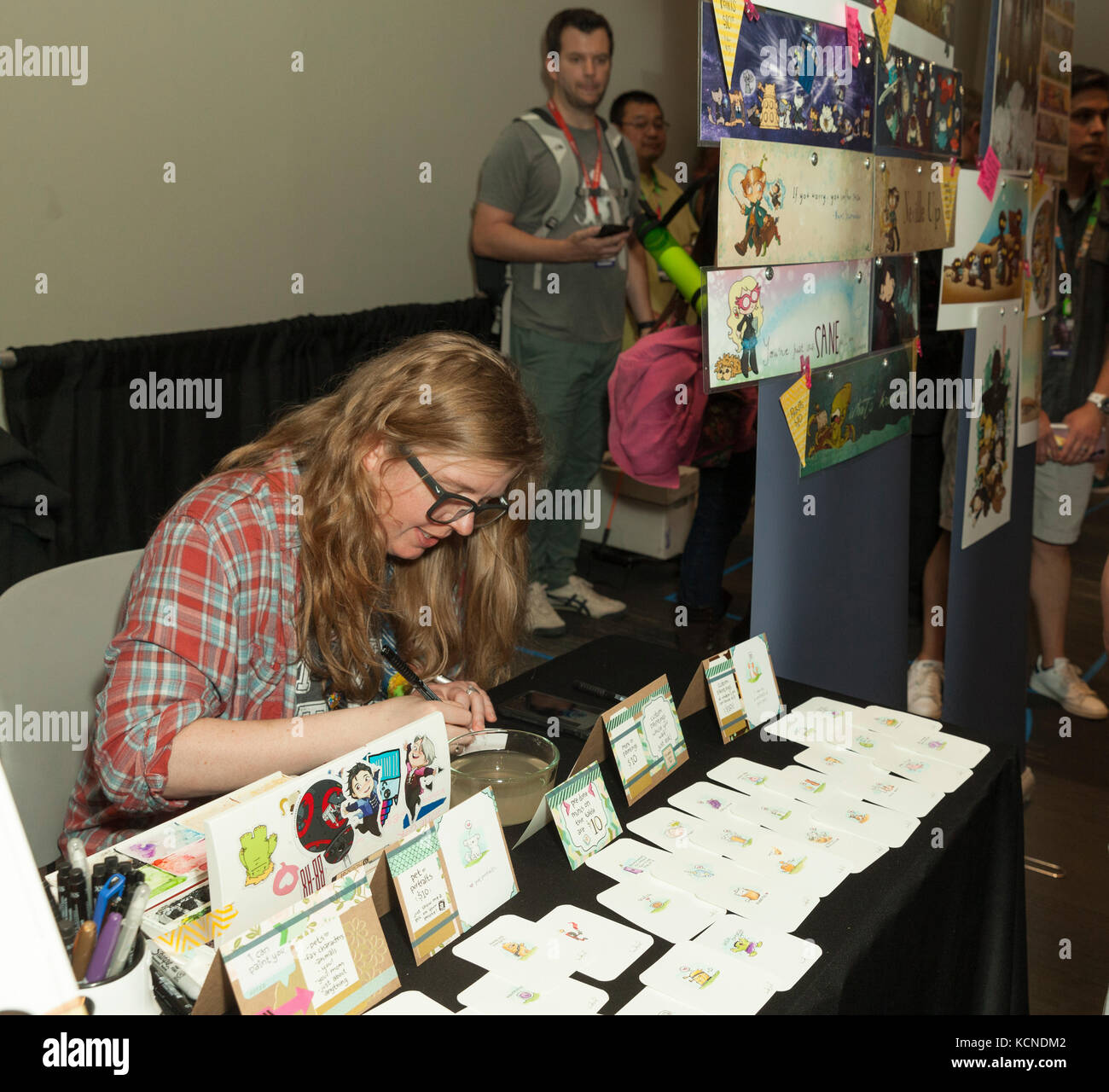 New York, NY - October 5, 2017: Katie Cook signs autograph for fans at ...