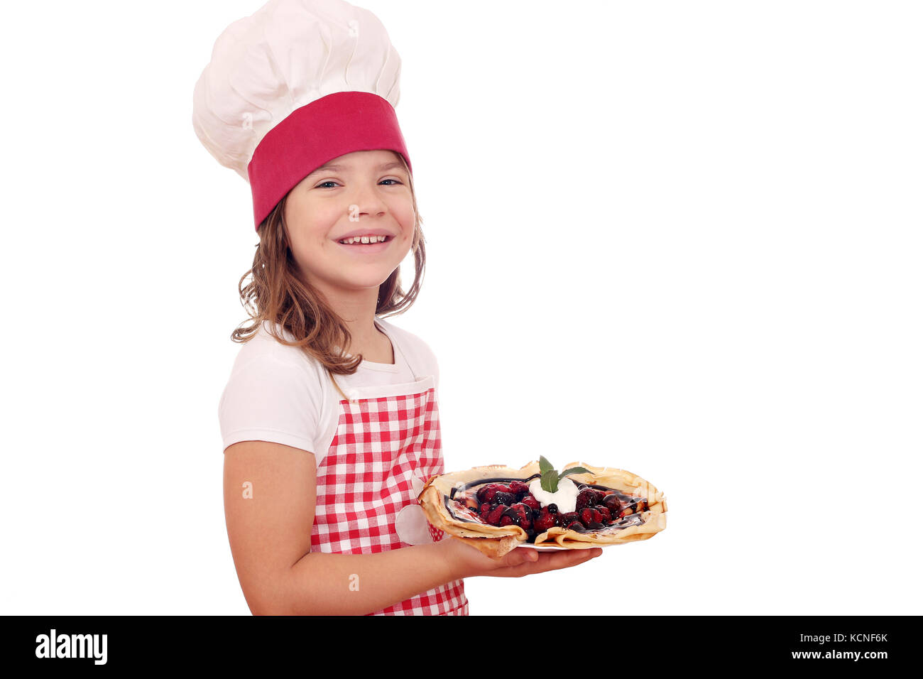 happy little girl cook with crepes dessert Stock Photo - Alamy
