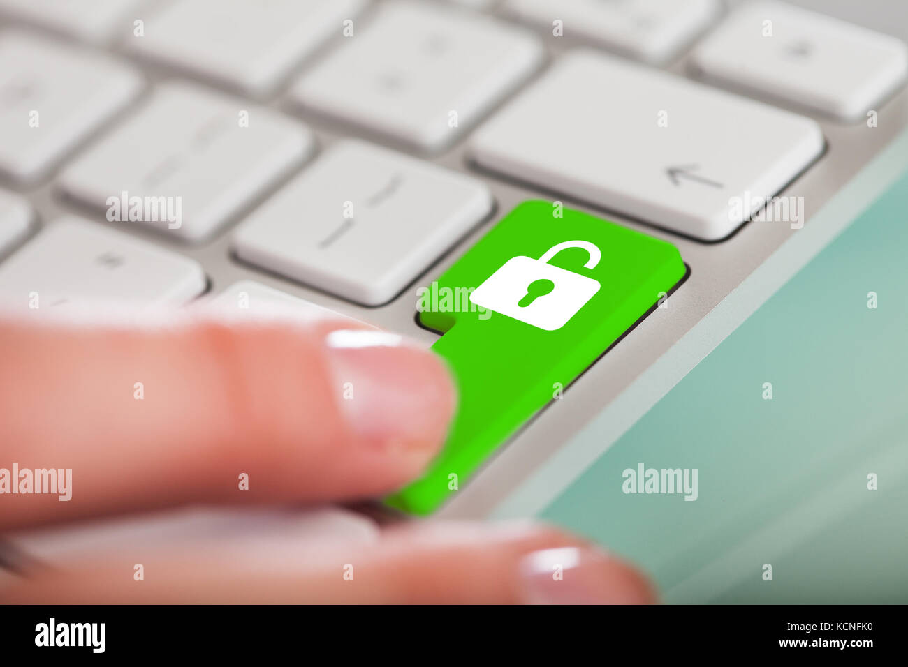 Close-up Of Hand Over Open Lock Green Button On The Keyboard Stock ...