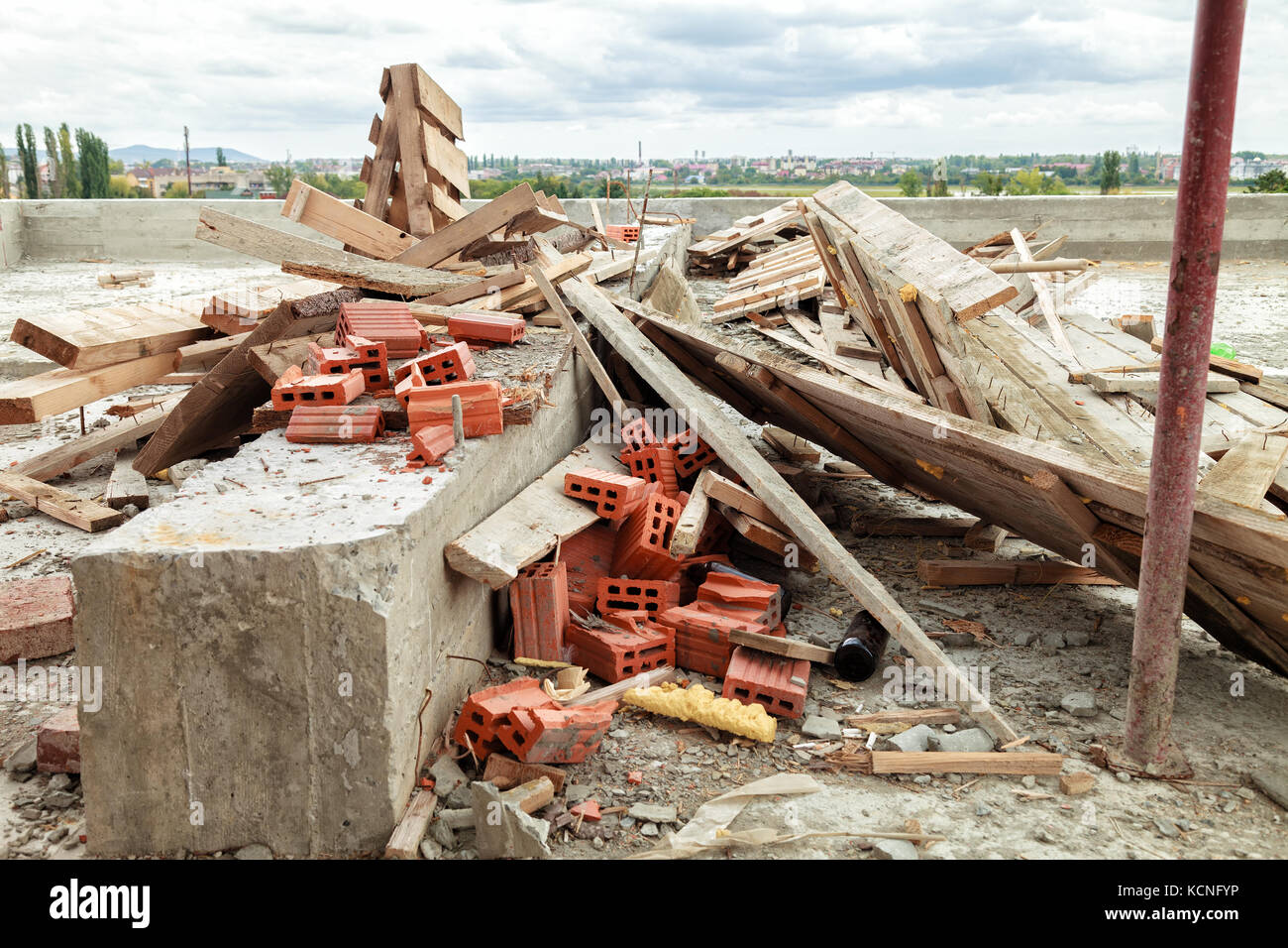 Construction waste on the roof of the house under construction ...