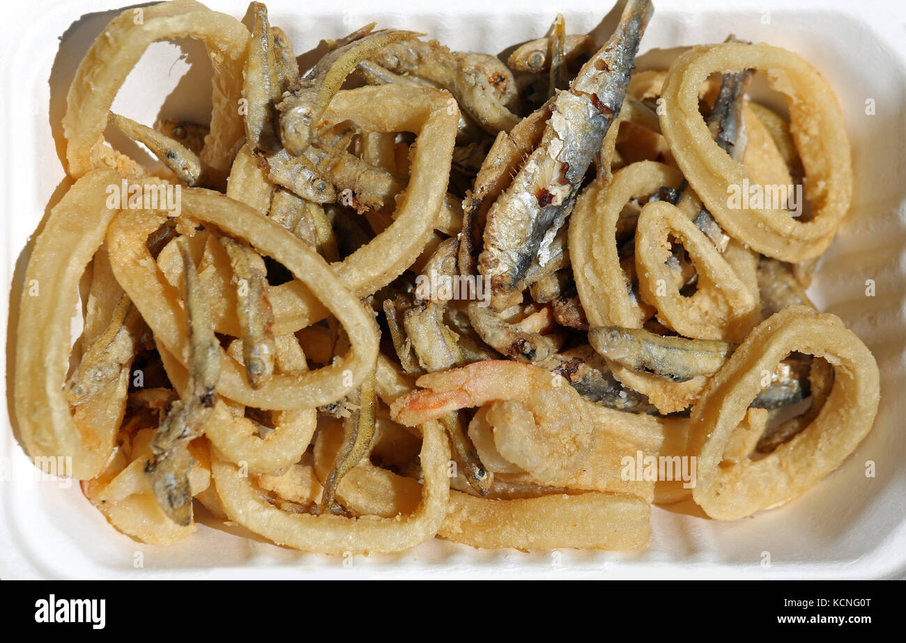 fried fish pan in the street food stand with sardine and calamari Stock ...