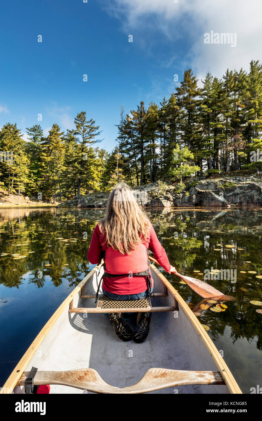 Woman canoe from behind hi-res stock photography and images - Alamy