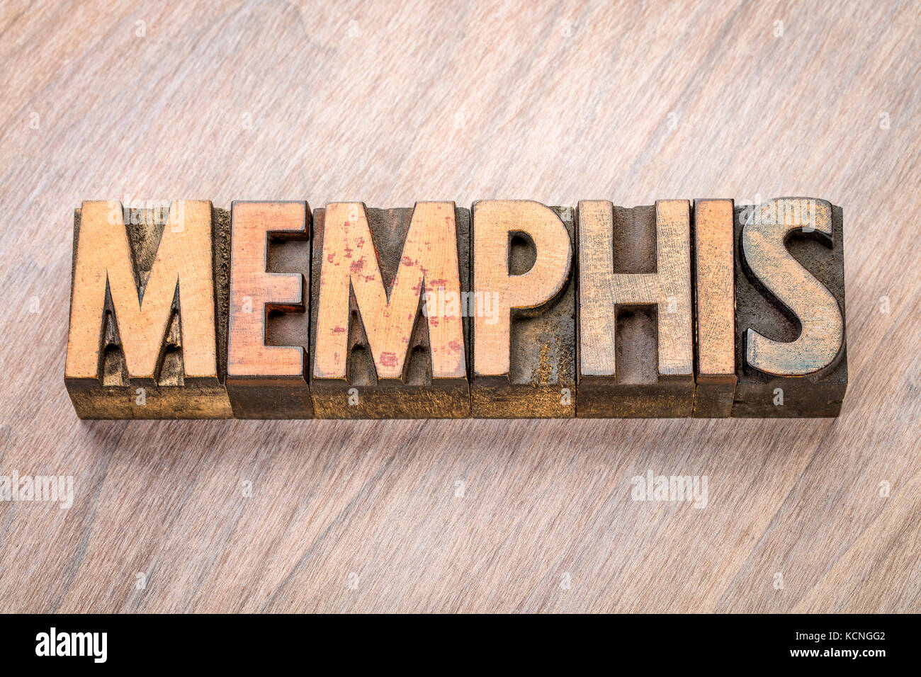 Memphis word abstract in vintage letterpress wood type against grained ...